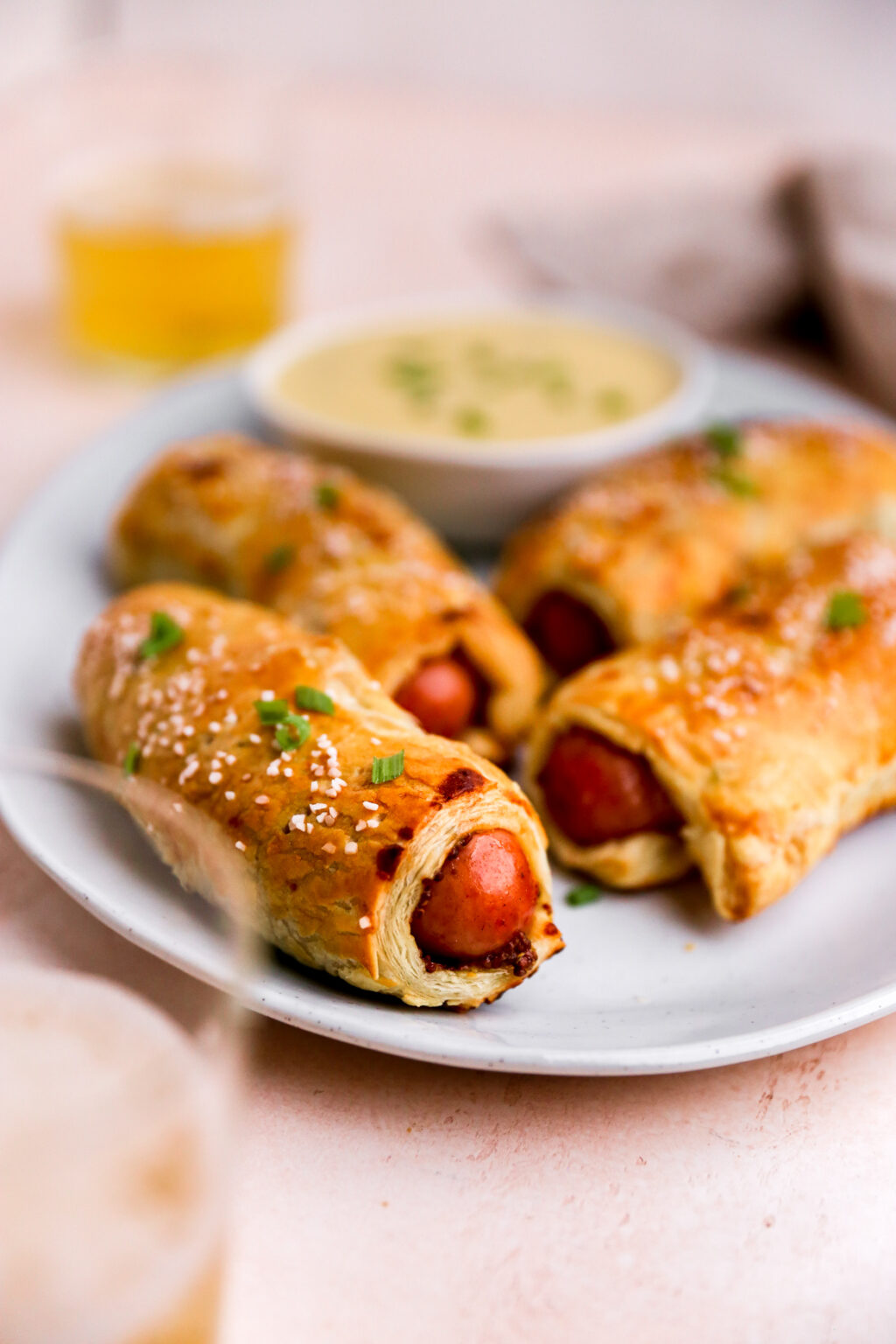 Puff Pastry Beer Brats with Beer-Cheese Sauce - Yes to Yolks